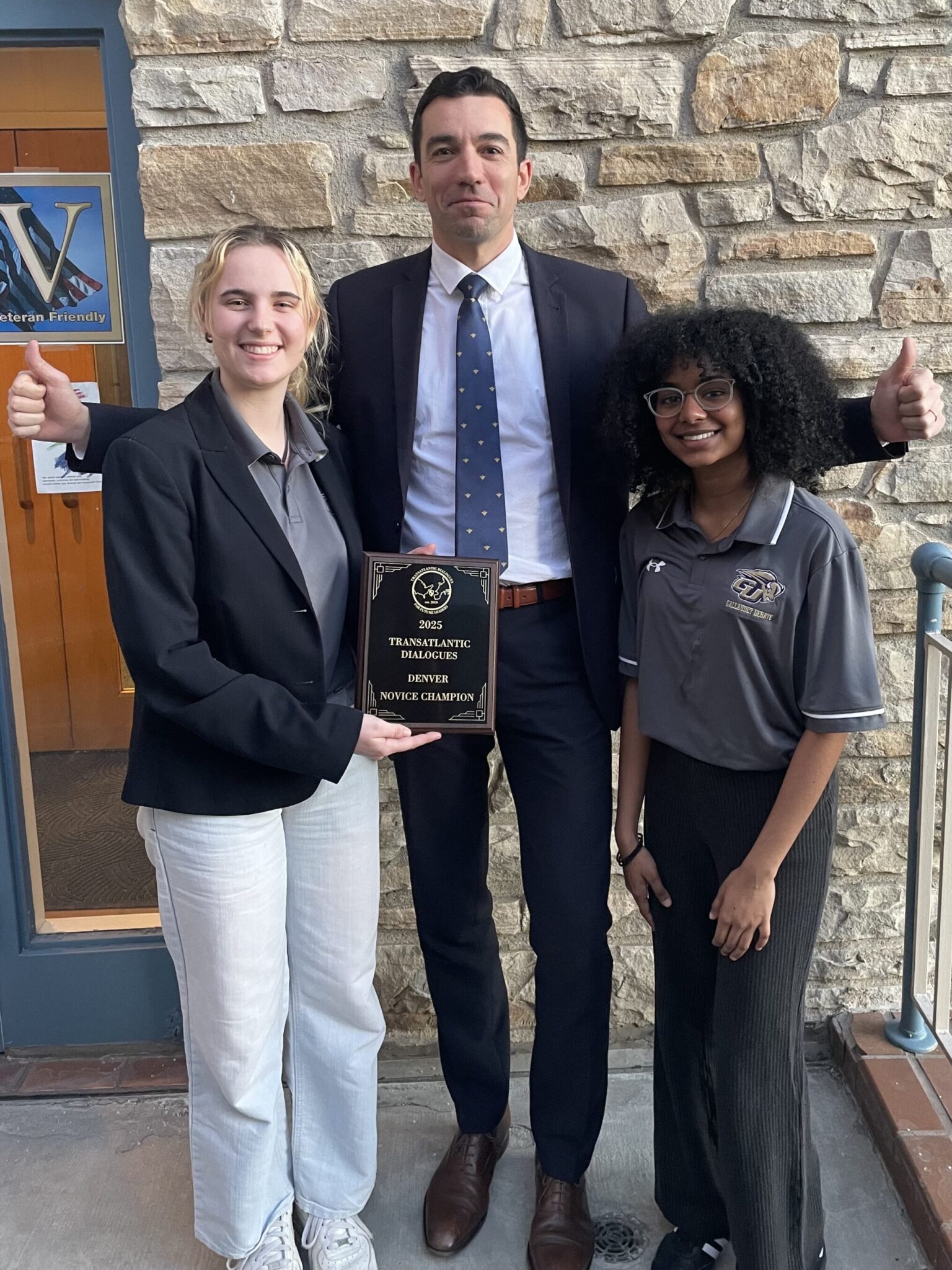 Debate team wins novice championship trophy with plan to fight ...